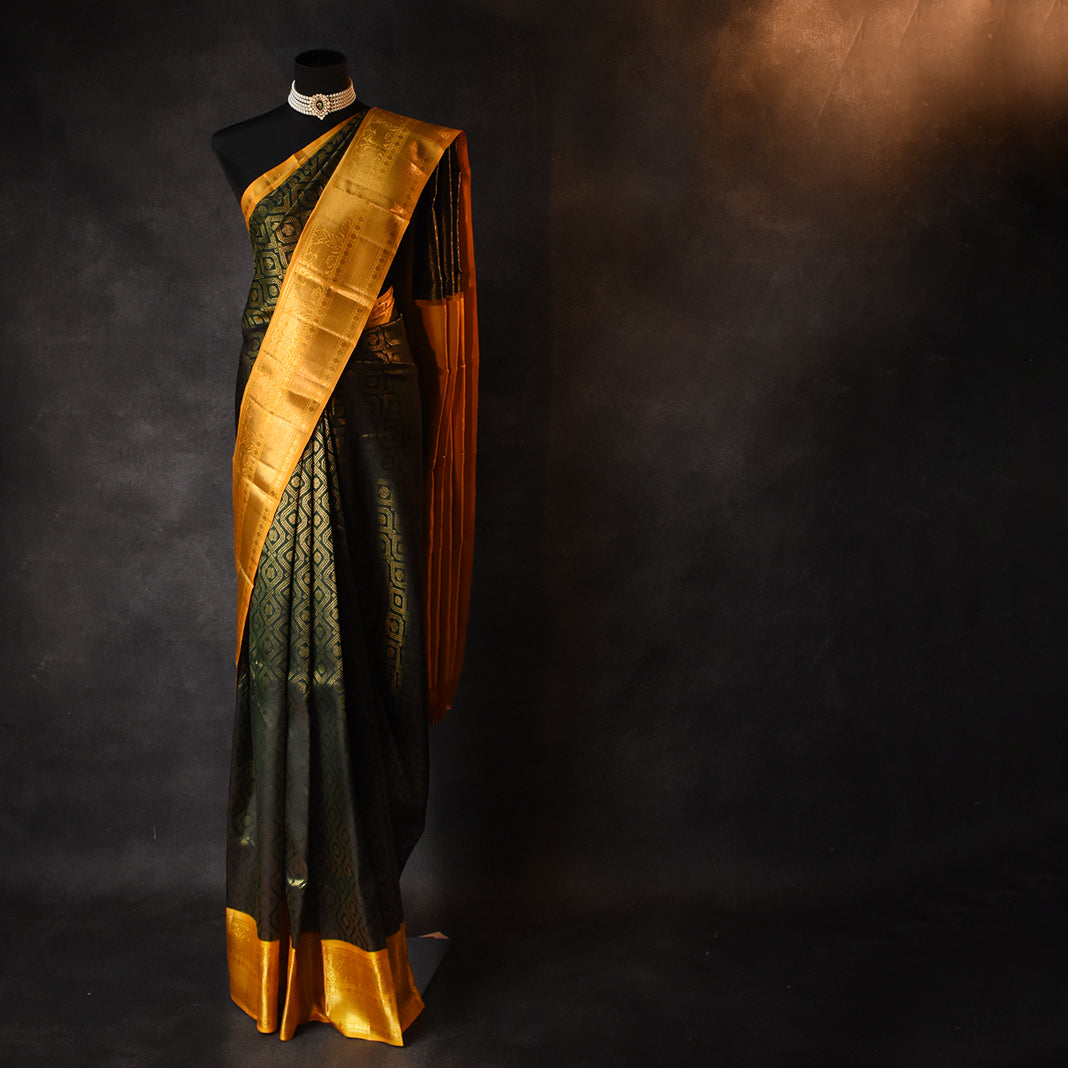 Bottle Green Kanchipuram Silk Saree with Mayil Chakaram Design